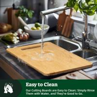 China Personalized Bamboo Cutting Board with Handle and Sustainable Oil-Preserving Function for sale