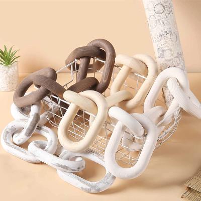 China Handcrafted Mango Wood Chain Link Decor for Folk Art Style Home Decoration for sale
