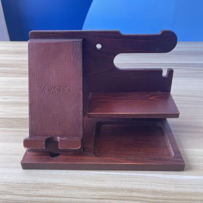 China Laser Engraved Wooden Lazy Holder Custom Cell Phone Stand with Phonestand and Pen Slot for sale