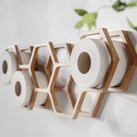 China Wooden Restroom Roll Rack with Wall Mount Tissue Storage Shelf in Honeycomb Design for sale