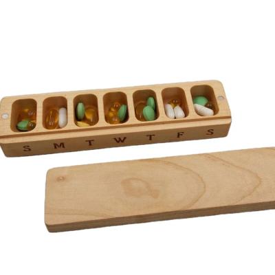 China Mini Wooden Box Portable Medicine Container 7 Day Pill Case Organizer Nature Ornament for sale