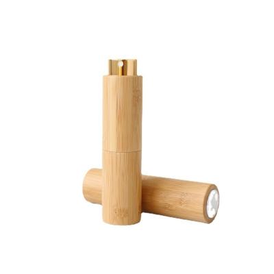 China Customized Logo Wooden Top Grade Glass Perfume Spray Bottle for Essential Oil Packing for sale