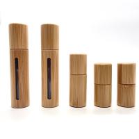 China Customized Logo Wooden Top Grade Glass Perfume Spray Bottle for Essential Oil Packing for sale