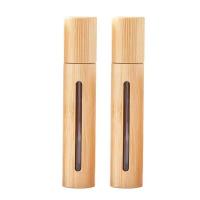 China Recyclable Bamboo Wood Skylight Covered Bamboo Bead Bottle for Perfume/Essential Oil for sale