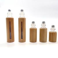 China Recyclable Bamboo Wood Skylight Covered Bamboo Bead Bottle for Perfume/Essential Oil for sale