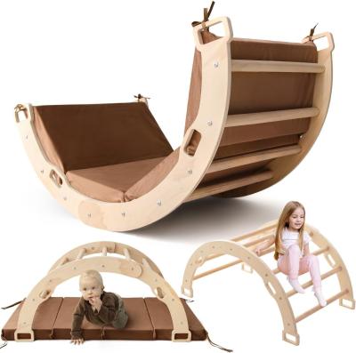 China Montessori Wooden Arch Climber Kids Climbing Toy with Cushion and Rocking Design for sale