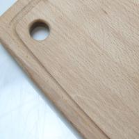 China Functional and Durable Solid Wood Beech Cutting Board with Handle Printing Burned for sale