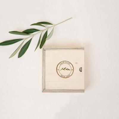 China Small Square Wooden Carved Packaging Box with Sliding Lid Environmental and Elegant Design for sale