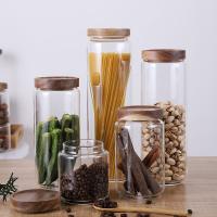 China Custom Capacity Stocked Sealed Clear Round Borosilicate Glass Packaging Containers Jar with Wood Lid for sale