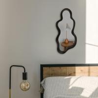 China Beautiful Home Decor Irregular Wall Mirror with Black Wooden Frame and Modern Bathroom Decoration for sale
