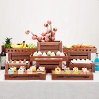 China Sapele Wood Buffet Restaurant Tableware Display Rack Catering Food Bread Display Stand for sale