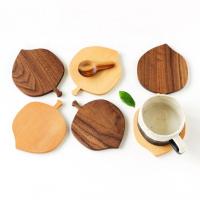 China Irregular Eco-Friendly Waterproof Coffee Cup Coaster Sustainable Beech Wooden Cup Mat for sale
