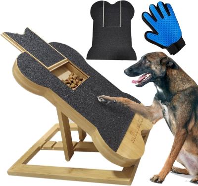 China Dog Nail Scratch Board with Treat Box Bone Shaped Dog Scratching Pad for Nails Paws OEM for sale