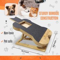 China Dog Nail Scratch Board with Treat Box Bone Shaped Dog Scratching Pad for Nails Paws OEM for sale