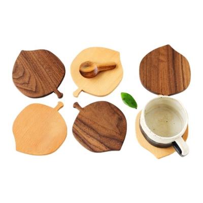 China Eco-Friendly Leaf-Shaped Beech Walnut Wood Coasters for Hot Drinks Sample Charge Free for sale