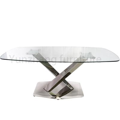 China Simple Luxury Modern Dining Tables Clear Tempered Glass Mirrored Silver Finish for sale