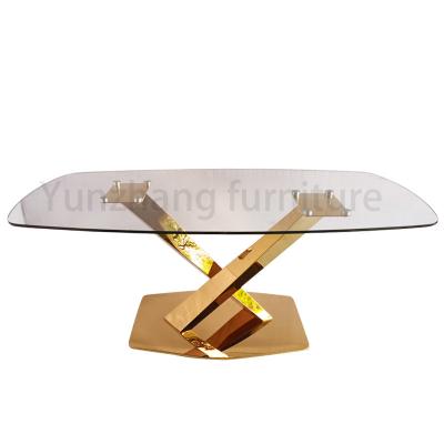 China Rectangular Design Glass Top Dining Table Clear Tempered SS201 Base Home Furniture for sale