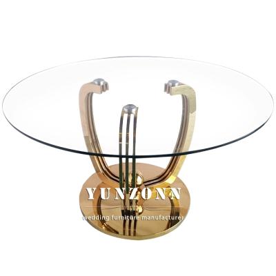 China Luxury Model Round Dining Table Transparent 10mm Thick Tempered Glass Top With Gold Base for sale