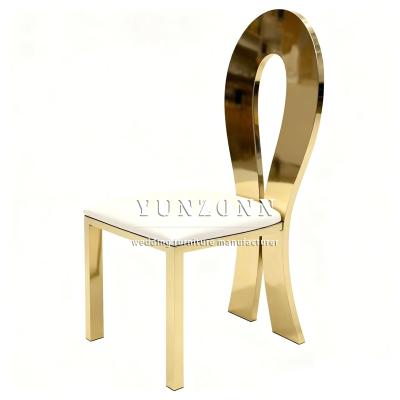 China Modern Style Gold Stainless Steel Frame White Pad Wedding Event Banquet Hotel Dining Metal Chairs for sale
