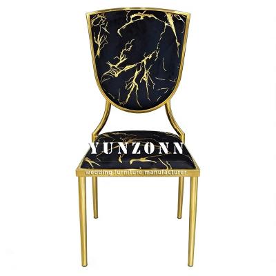 China Gold Themed Weddings and Hotels Black Velvet Cushioned Metal Stackable Banquet Chairs for sale