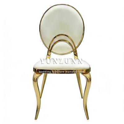 China Cheap Hotel Wedding Party Events Furniture White PU Cushion Gold Stainless Steel Round Back Dining Chair Bride and Groom for sale