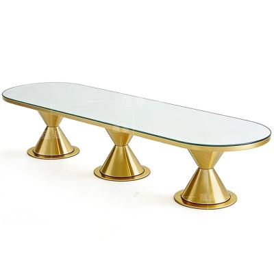China Luxurious New Arrival Modern Gold Stainless Steel Legs Oval Outdoor Dining Wedding Table with Tempered Glass Top Hotel Furniture for sale