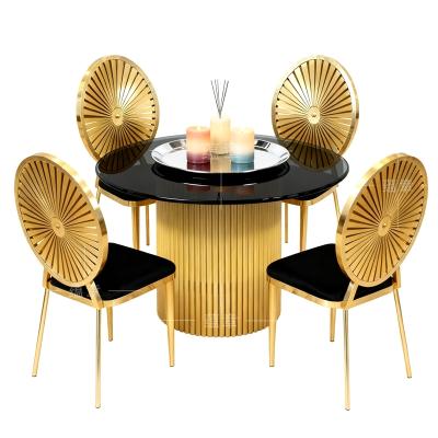 China Wedding Furniture Gold Stainless Steel Frame Tempered Mirror Glass Top Dining Table for sale