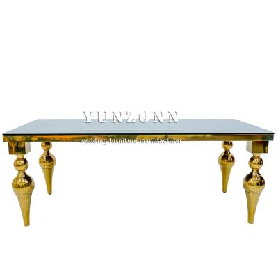 China Foshan Factory Cheap Price Hotel Dining Furniture Gold Stainless Steel Mirror Glass Table Top Wedding Table for sale