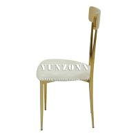China Contemporary Event Hotel Banquet Furniture White Leather Gold Metal Stackable Wedding Chairs for sale