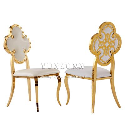 China Luxury Hotel Wedding Four Leaf Clover Back Design Glossy Gold Chair for Mariage Ceremony for sale