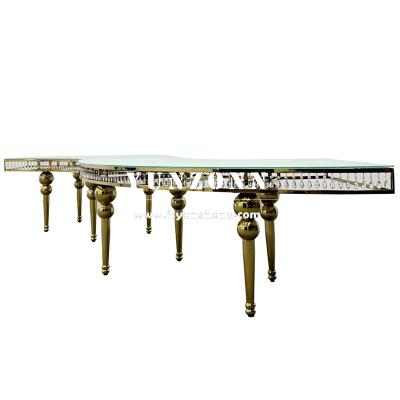 China Hot Selling Serpentine Transparent Glass Top Crystal Stainless Steel Table Banquet Restaurant Reception Center Moon Table for sale