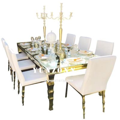China Hotel Hall Restaurant Furniture Metal Frame 8 Seater Glass Dining Table with Chair for sale