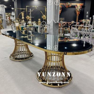 China Factory Direct Wedding Decoration Table 8FT Long Wedding Banquet Oval Gold Stainless Steel Table Glass Table for sale