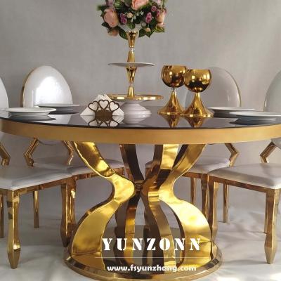 China Custom Contemporary Stainless Steel Pedestal Design Gold Hotel Royal Restaurant Luxury Round Glass Dining Tables for sale