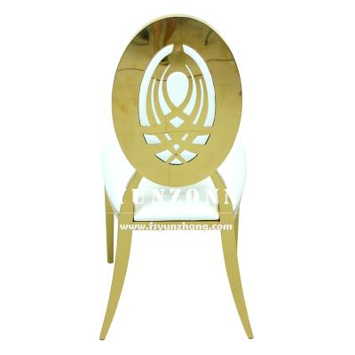 China Gold Royal Hotel Event Wedding Commercial Furniture 304 Stainless Steel Chair with Oval Back Flower Design for sale