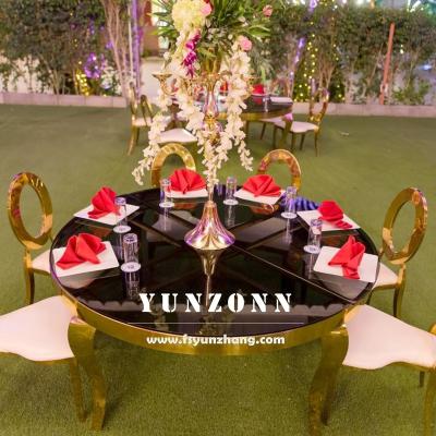 China Luxury Modern Stainless Steel Dining Table with Glass Top for Outdoor Wedding Hotel Party Banquet Round Design for sale