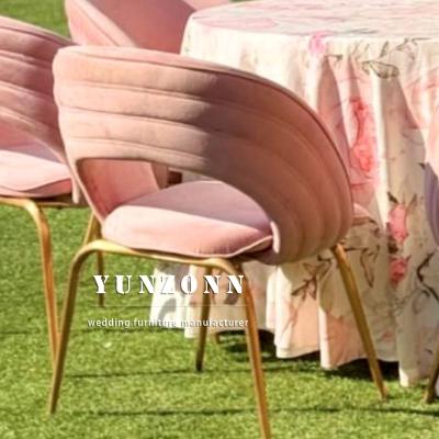 China New Designed Modern Style Upholstered Pink Velvet Gold Metal Arm Chair Wedding Chair for sale
