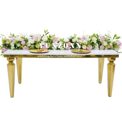 China Modern Rectangle Venus Gold Dining Table with Transparent Glass Top and Stainless Steel Frame for Events and Banquets for sale