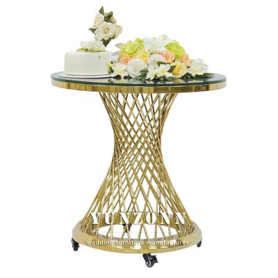 China Luxury Gold Stainless Steel Mirror Glass Top Wedding Decoration Cake Stand Table for sale