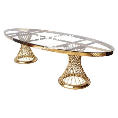 China Luxury Gold Stainless Steel Oval Table and Chairs Set for Wedding Parties and Hotel Furniture for sale
