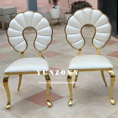 China Modern Luxury Wedding Chair New Model with Golden Flower Design Comfortable Back PU Leather Durable French Style Stainless Steel for sale