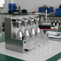 China Bottle Cap Injection Mold Designed for Cosmetic Packaging Component Production for sale