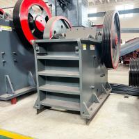 China Rocks Granite Marble Pec Jaw Stone Crusher with Conveyor Belt Inlet Size 0-410mm for sale