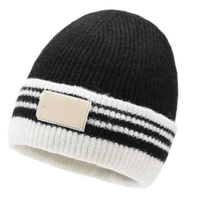 China Striped Warm Versatile Knitted Hat for Autumn and Winter Beanie for sale