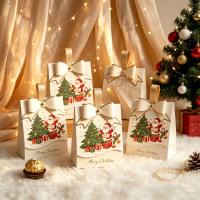 China Christmas Candy Gift Box with Cartoon Santa & Pine Tree Design and Light Luxury Satin White Bow for Holiday Parties for sale