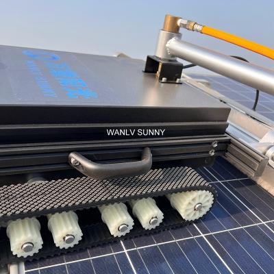 China DC Motor Controls Travel and Brush Rotation PV Cleaning Robot for Solar Panel Cleaning 120W for sale
