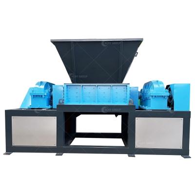 China Waste Rubber Tyre Recycling Machine Scrap Rubber Crusher Double Shaft Shredder With Rotary Screen for sale