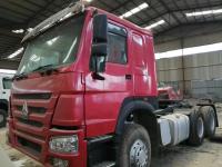 China 2015 made in china tractor head 6*4 10 Tires Sinotruck Howo tipper  dump truck tractor truck flatbed semi-trailer for sale