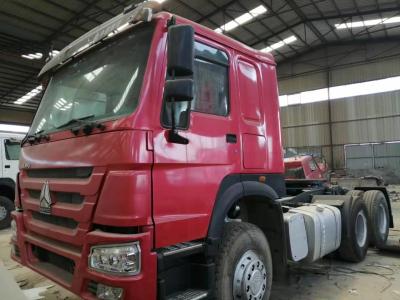 China 2015 made in china tractor head 6*4 10 Tires Sinotruck Howo tipper  dump truck tractor truck flatbed semi-trailer for sale