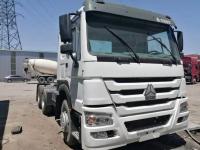 China dumper semi trailer tractor head 6*4 10 Tires Sinotruck Howo tipper  dump truck tractor truck flatbed semi-trailer for sale